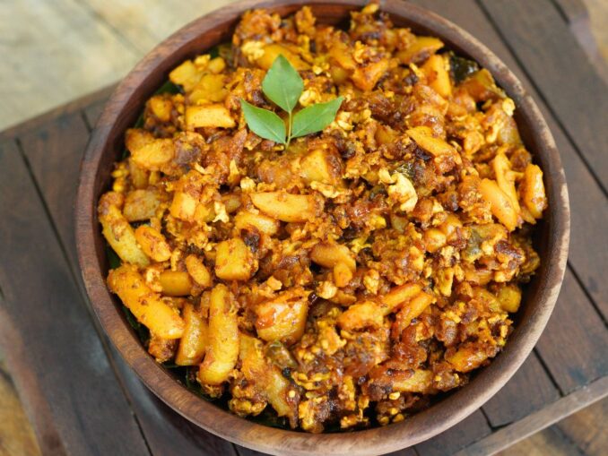 Village-style crispy and crunchy peanut chikki or kappalandi mittayi ...